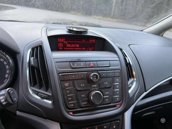 Grey Opel Zafira 2015 in Kaunas, with an engine capacity of 1.96 L and mileage of 287 thousand km for 4500 €, photo 11 on AUTOMOTO.COM.LV