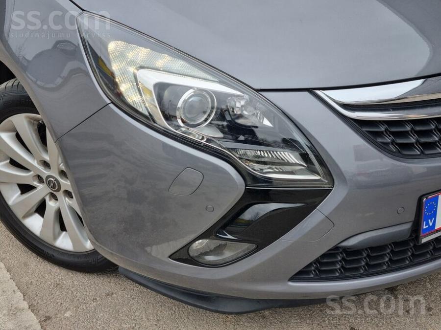 Grey Opel Zafira 2016 in Ogre, with an engine capacity of 1.40 L and mileage of 300 thousand km for 6250 €, photo 26 on AUTOMOTO.COM.LV