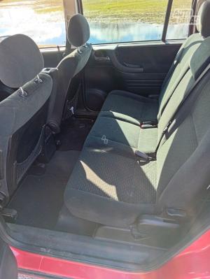 Sarkans Opel Zafira 2003 Akmenė, ar dzinēja tilpumu 2.00 L un nobraukumu 247 tūkst. km par 700 €, foto 9 vietnē AUTOMOTO.COM.LV