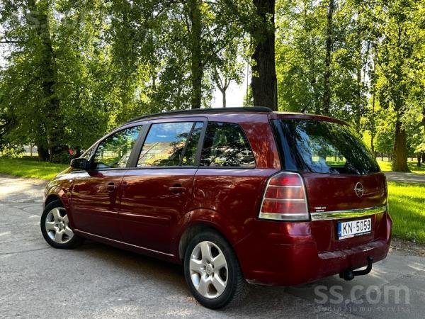 Red Opel Zafira 2006 in Riga, with an engine capacity of 1.90 L and mileage of 421 thousand km for 1530 €, photo 3 on AUTOMOTO.COM.LV