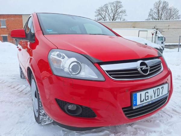 Red Opel Zafira 2011 in Jonava, with an engine capacity of 1.69 L and mileage of 282 thousand km for 2950 €, photo 3 on AUTOMOTO.COM.LV