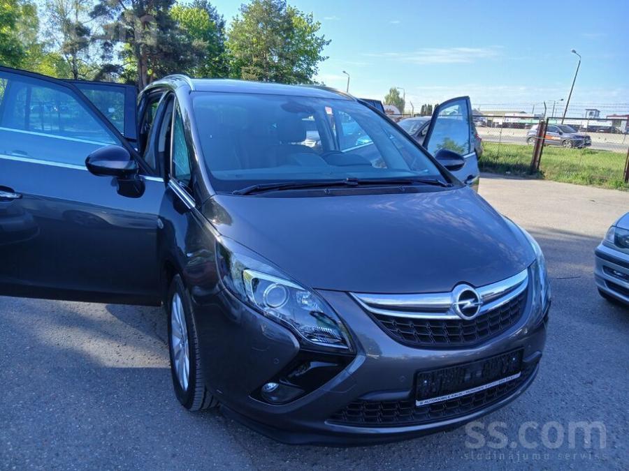 Red Opel Zafira 2012 in Riga, with an engine capacity of 2.00 L and mileage of 214 thousand km for 2350 €, photo 21 on AUTOMOTO.COM.LV