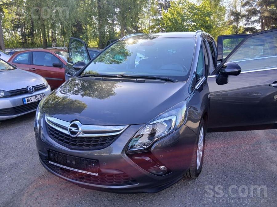 Red Opel Zafira 2012 in Riga, with an engine capacity of 2.00 L and mileage of 214 thousand km for 2350 €, photo 22 on AUTOMOTO.COM.LV