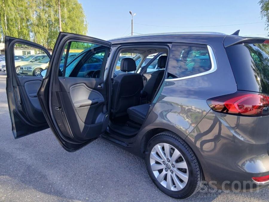 Red Opel Zafira 2012 in Riga, with an engine capacity of 2.00 L and mileage of 214 thousand km for 2350 €, photo 24 on AUTOMOTO.COM.LV