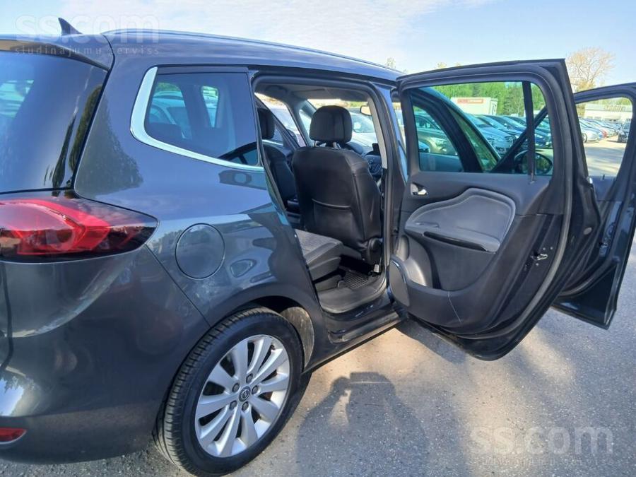 Red Opel Zafira 2012 in Riga, with an engine capacity of 2.00 L and mileage of 214 thousand km for 2350 €, photo 25 on AUTOMOTO.COM.LV