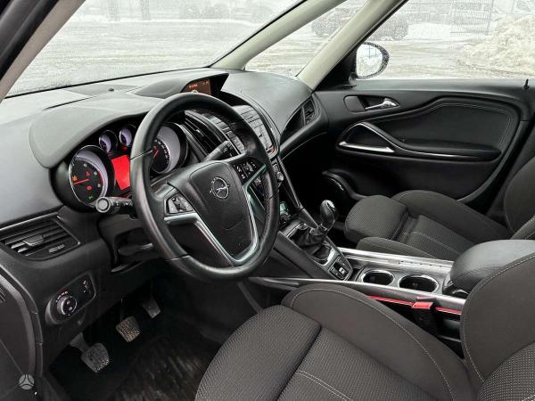 Black Opel Zafira Tourer 2012 in Marijampole, with an engine capacity of 2.00 L and mileage of 238 thousand km for 3350 €, photo 11 on AUTOMOTO.COM.LV