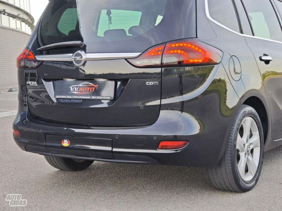 Black Opel Zafira Tourer 2012 in Vilnius, with an engine capacity of 2.00 L and mileage of 291 thousand km for 5300 €, photo 11 on AUTOMOTO.COM.LV