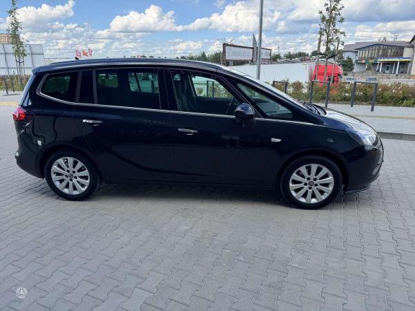Melns Opel Zafira Tourer 2012 Viļņa, ar dzinēja tilpumu 1.96 L un nobraukumu 300 tūkst. km par 4400 €, foto 4 vietnē AUTOMOTO.COM.LV