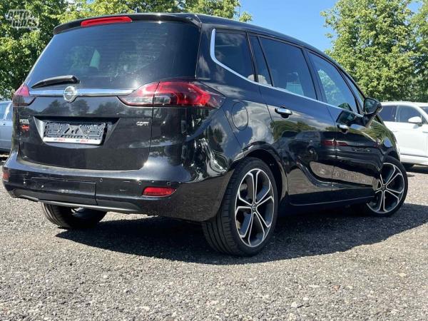 Black Opel Zafira Tourer 2012 in Kaunas, with an engine capacity of 2.00 L and mileage of 296 thousand km for 4999 €, photo 3 on AUTOMOTO.COM.LV