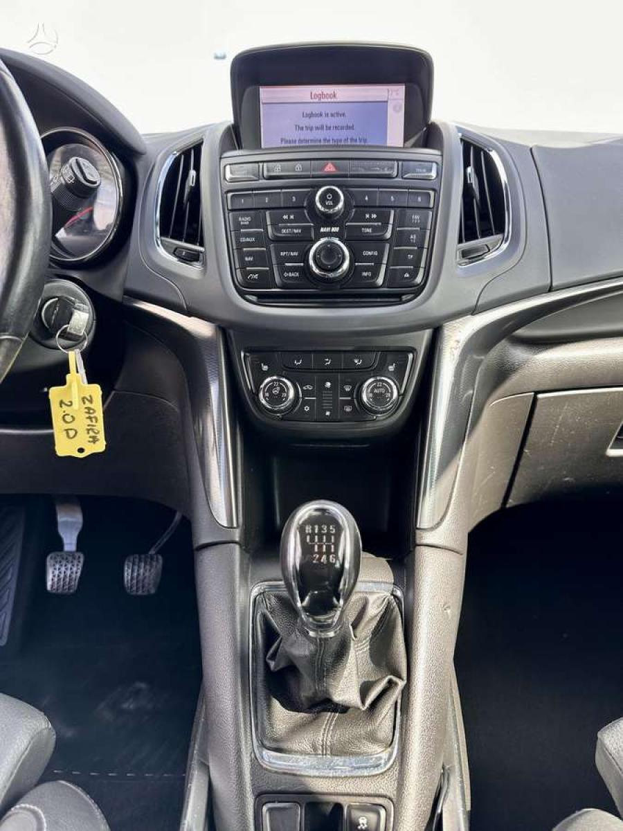 Black Opel Zafira Tourer 2012 in Marijampole, with an engine capacity of 2.00 L and mileage of 178 thousand km for 4400 €, photo 14 on AUTOMOTO.COM.LV