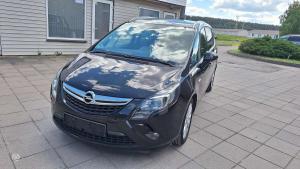 Black Opel Zafira Tourer 2012 in Vilnius, with an engine capacity of 1.36 L and mileage of 198 thousand km for 4950 €, photo 3 on AUTOMOTO.COM.LV