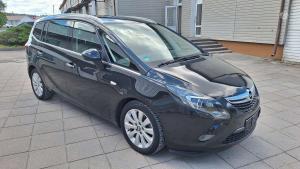Black Opel Zafira Tourer 2012 in Vilnius, with an engine capacity of 1.36 L and mileage of 198 thousand km for 4950 €, photo 6 on AUTOMOTO.COM.LV