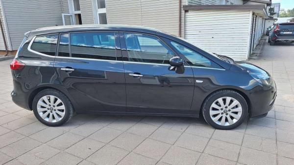Black Opel Zafira Tourer 2012 in Vilnius, with an engine capacity of 1.36 L and mileage of 198 thousand km for 4950 €, photo 6 on AUTOMOTO.COM.LV