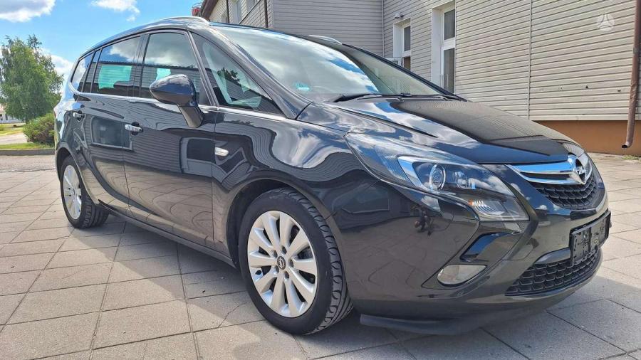 Black Opel Zafira Tourer 2012 in Vilnius, with an engine capacity of 1.36 L and mileage of 198 thousand km for 4950 €, photo 34 on AUTOMOTO.COM.LV