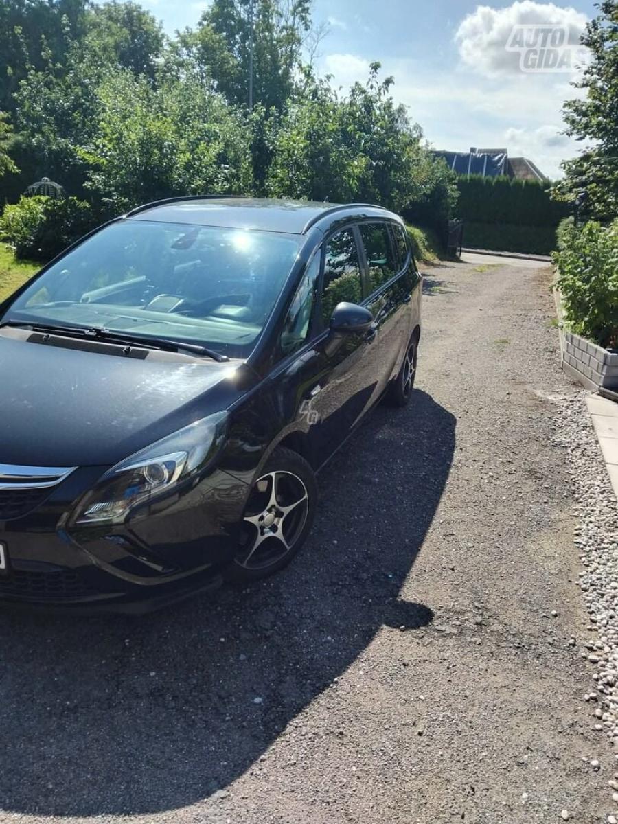 Melns Opel Zafira Tourer 2012 Raseiniai, ar dzinēja tilpumu 2.10 L un nobraukumu 404 tūkst. km par 4500 €, foto 6 vietnē AUTOMOTO.COM.LV