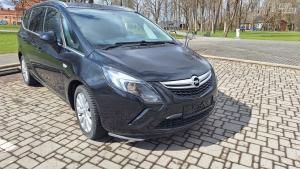 Black Opel Zafira Tourer 2013 in Kelme, with an engine capacity of 1.40 L and mileage of 123 thousand km for 4800 €, photo  on AUTOMOTO.COM.LV