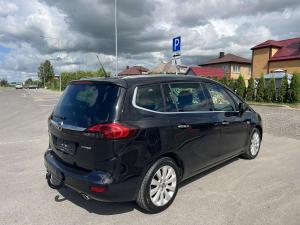 Black Opel Zafira Tourer 2013 in Siauliai, with an engine capacity of 1.96 L and mileage of 261 thousand km for 3750 €, photo 5 on AUTOMOTO.COM.LV