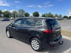 Black Opel Zafira Tourer 2013 in Siauliai, with an engine capacity of 1.96 L and mileage of 261 thousand km for 3750 €, photo 7 on AUTOMOTO.COM.LV