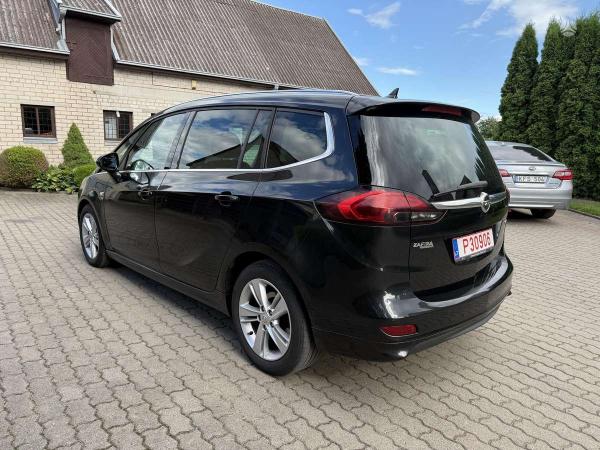 Melns Opel Zafira Tourer 2013 Tauragė, ar dzinēja tilpumu 1.96 L un nobraukumu 264 tūkst. km par 4900 €, foto 4 vietnē AUTOMOTO.COM.LV