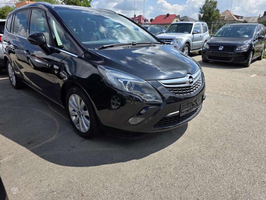 Black Opel Zafira Tourer 2013 in Siauliai, with an engine capacity of 1.96 L and mileage of 261 thousand km for 4500 €, photo 3 on AUTOMOTO.COM.LV