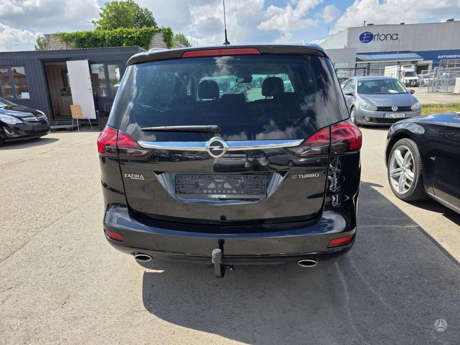 Black Opel Zafira Tourer 2013 in Siauliai, with an engine capacity of 1.96 L and mileage of 261 thousand km for 4500 €, photo 7 on AUTOMOTO.COM.LV