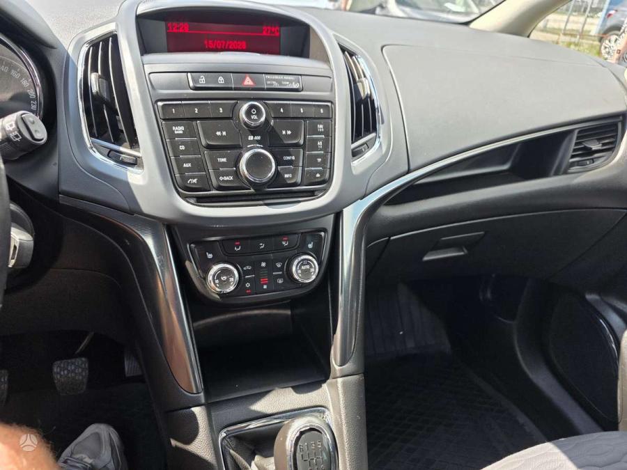 Black Opel Zafira Tourer 2013 in Siauliai, with an engine capacity of 1.96 L and mileage of 261 thousand km for 4500 €, photo 16 on AUTOMOTO.COM.LV