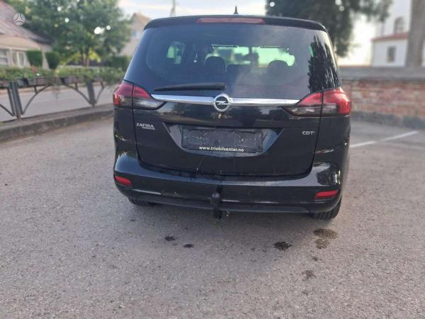 Black Opel Zafira Tourer 2013 in Raseiniai, with an engine capacity of 1.96 L and mileage of 291 thousand km for 3300 €, photo 7 on AUTOMOTO.COM.LV