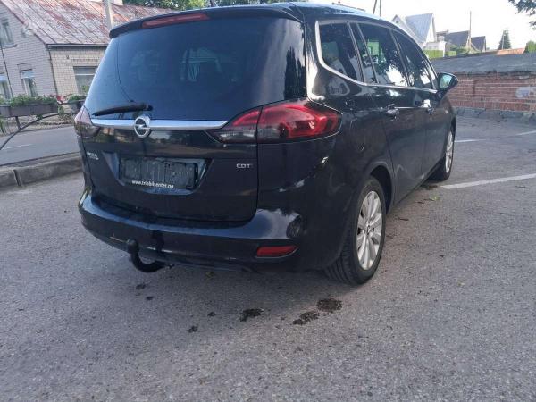 Black Opel Zafira Tourer 2013 in Raseiniai, with an engine capacity of 1.96 L and mileage of 291 thousand km for 3300 €, photo 10 on AUTOMOTO.COM.LV