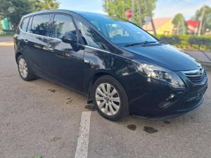 Black Opel Zafira Tourer 2013 in Raseiniai, with an engine capacity of 1.96 L and mileage of 291 thousand km for 3300 €, photo 21 on AUTOMOTO.COM.LV