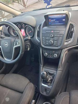 Black Opel Zafira Tourer 2013 in Raseiniai, with an engine capacity of 1.96 L and mileage of 291 thousand km for 3300 €, photo 31 on AUTOMOTO.COM.LV