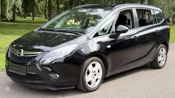Black Opel Zafira Tourer 2013 in Panevezys, with an engine capacity of 1.96 L and mileage of 260 thousand km for 4000 €, photo 1 on AUTOMOTO.COM.LV