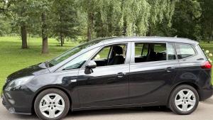 Black Opel Zafira Tourer 2013 in Panevezys, with an engine capacity of 1.96 L and mileage of 260 thousand km for 4000 €, photo 6 on AUTOMOTO.COM.LV