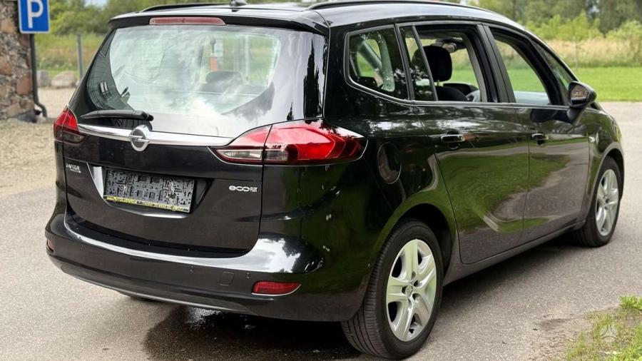Black Opel Zafira Tourer 2013 in Panevezys, with an engine capacity of 1.96 L and mileage of 260 thousand km for 4000 €, photo 10 on AUTOMOTO.COM.LV