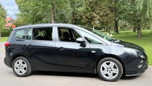 Black Opel Zafira Tourer 2013 in Panevezys, with an engine capacity of 1.96 L and mileage of 260 thousand km for 4000 €, photo 12 on AUTOMOTO.COM.LV