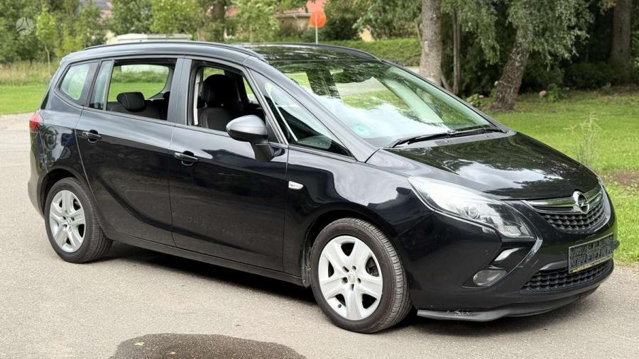 Black Opel Zafira Tourer 2013 in Panevezys, with an engine capacity of 1.96 L and mileage of 260 thousand km for 4000 €, photo 13 on AUTOMOTO.COM.LV
