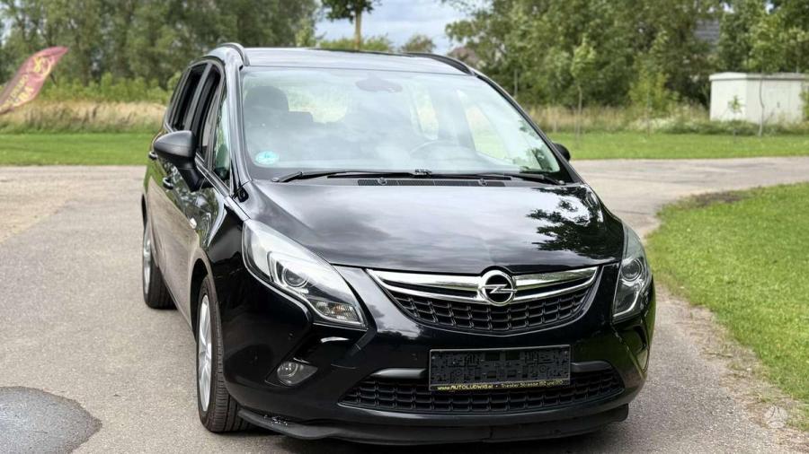 Black Opel Zafira Tourer 2013 in Panevezys, with an engine capacity of 1.96 L and mileage of 260 thousand km for 4000 €, photo 14 on AUTOMOTO.COM.LV