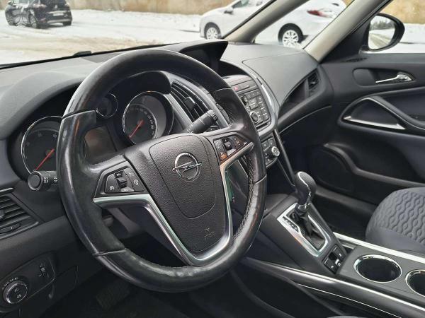 Black Opel Zafira Tourer 2014 in Kaunas, with an engine capacity of 1.96 L and mileage of 330 thousand km for 5500 €, photo 11 on AUTOMOTO.COM.LV