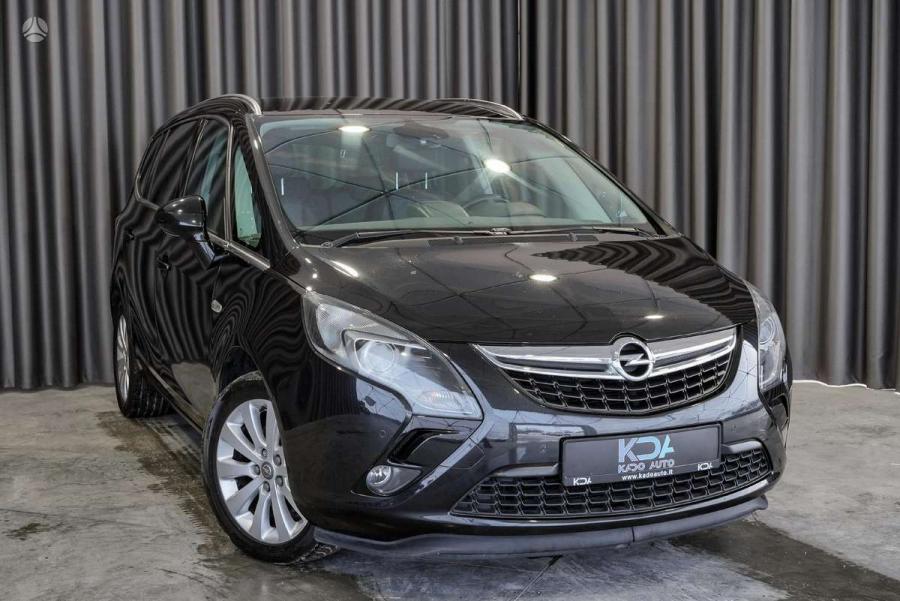 Black Opel Zafira Tourer 2014 in Marijampole, with an engine capacity of 1.96 L and mileage of 250 thousand km for 5450 €, photo 2 on AUTOMOTO.COM.LV