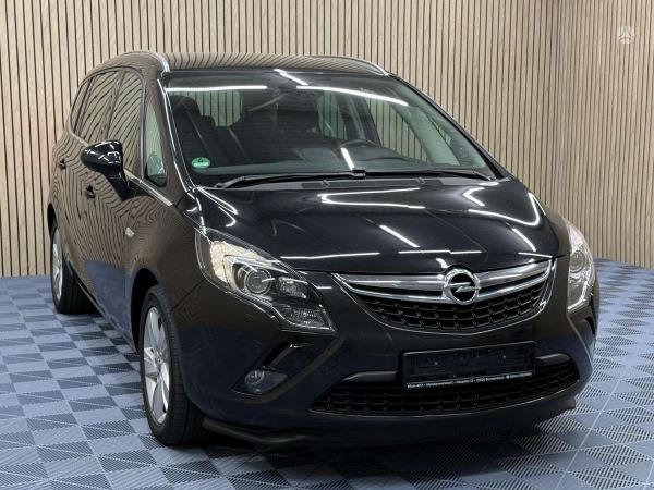Black Opel Zafira Tourer 2014 in Marijampole, with an engine capacity of 1.96 L and mileage of 232 thousand km for 5650 €, photo 1 on AUTOMOTO.COM.LV