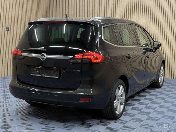 Black Opel Zafira Tourer 2014 in Marijampole, with an engine capacity of 1.96 L and mileage of 232 thousand km for 5650 €, photo 8 on AUTOMOTO.COM.LV