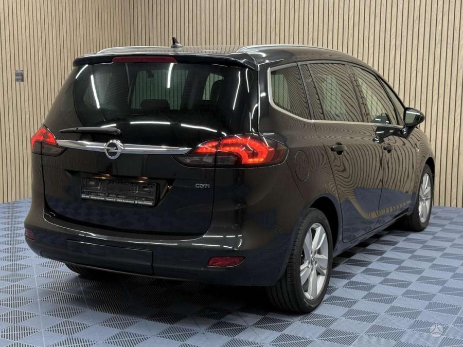 Black Opel Zafira Tourer 2014 in Marijampole, with an engine capacity of 1.96 L and mileage of 232 thousand km for 5650 €, photo 8 on AUTOMOTO.COM.LV