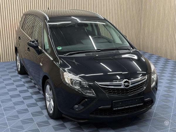 Black Opel Zafira Tourer 2014 in Marijampole, with an engine capacity of 1.96 L and mileage of 232 thousand km for 5650 €, photo 9 on AUTOMOTO.COM.LV