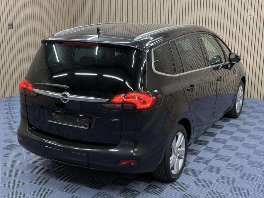 Black Opel Zafira Tourer 2014 in Marijampole, with an engine capacity of 1.96 L and mileage of 232 thousand km for 5650 €, photo 12 on AUTOMOTO.COM.LV