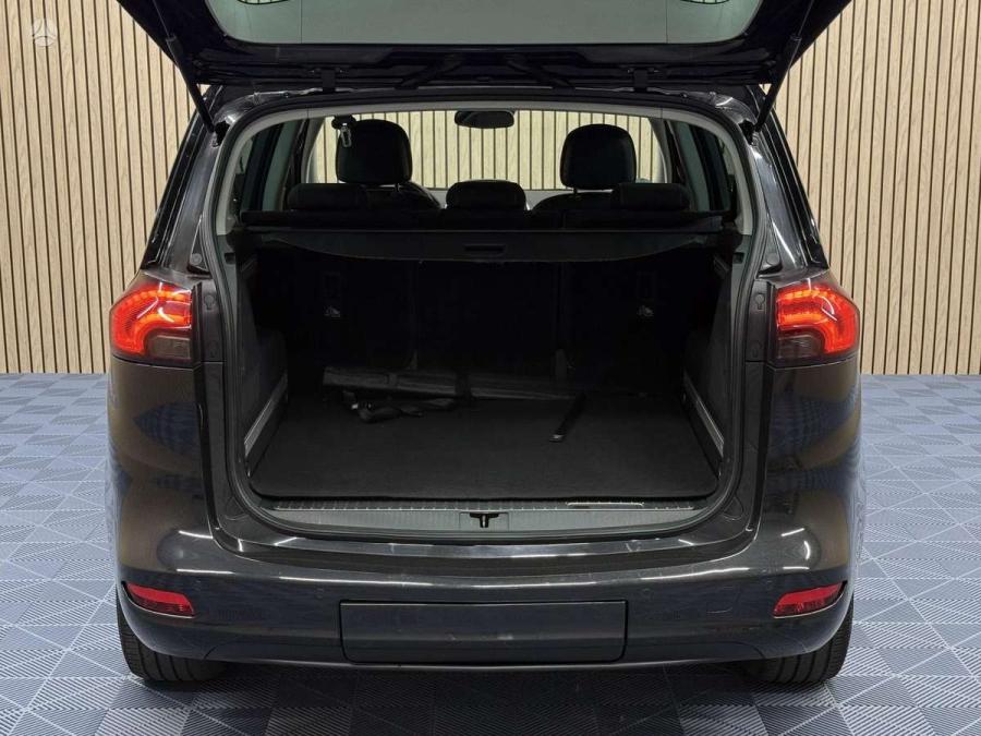 Black Opel Zafira Tourer 2014 in Marijampole, with an engine capacity of 1.96 L and mileage of 232 thousand km for 5650 €, photo 14 on AUTOMOTO.COM.LV