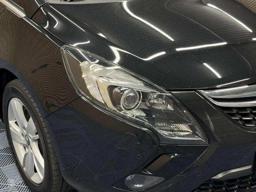 Black Opel Zafira Tourer 2014 in Marijampole, with an engine capacity of 1.96 L and mileage of 232 thousand km for 5650 €, photo 29 on AUTOMOTO.COM.LV