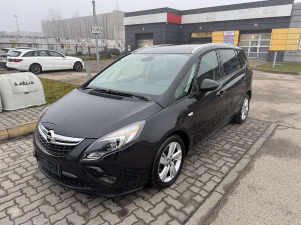 Black Opel Zafira Tourer 2015 in Kaunas, with an engine capacity of 1.96 L and mileage of 166 thousand km for 6350 €, photo 3 on AUTOMOTO.COM.LV