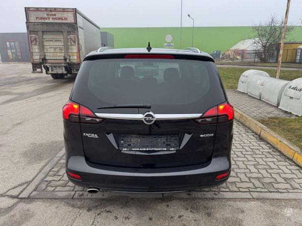 Black Opel Zafira Tourer 2015 in Kaunas, with an engine capacity of 1.96 L and mileage of 166 thousand km for 6350 €, photo 5 on AUTOMOTO.COM.LV