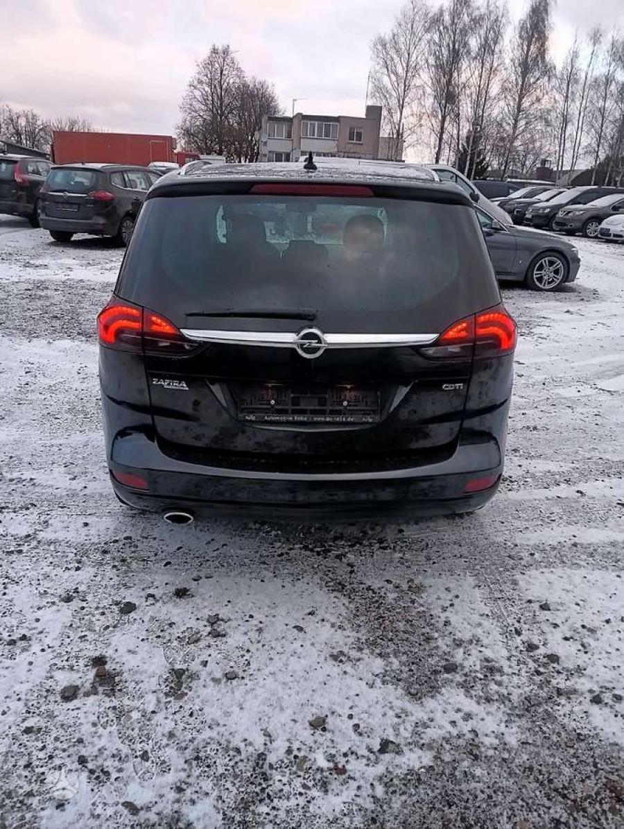 Melns Opel Zafira Tourer 2015 Ukmergė, ar dzinēja tilpumu 1.96 L un nobraukumu 293 tūkst. km par 5200 €, foto 6 vietnē AUTOMOTO.COM.LV