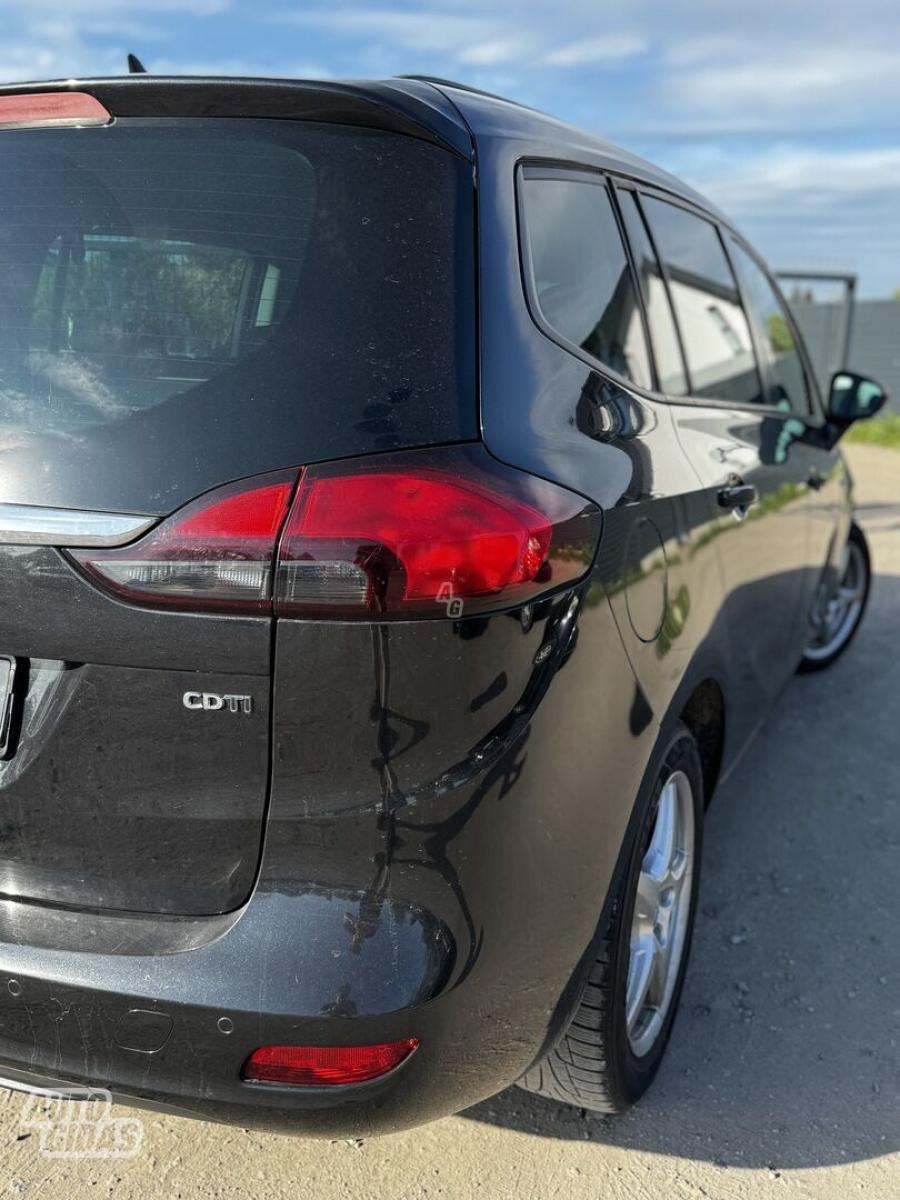 Black Opel Zafira Tourer 2015 in Klaipeda, with an engine capacity of 2.00 L and mileage of 285 thousand km for 5750 €, photo 6 on AUTOMOTO.COM.LV