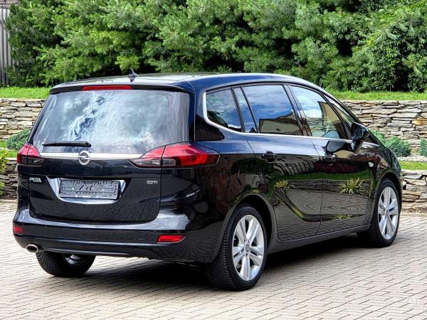 Melns Opel Zafira Tourer 2015 Kėdainiai, ar dzinēja tilpumu 1.96 L un nobraukumu 199 tūkst. km par 6650 €, foto 10 vietnē AUTOMOTO.COM.LV